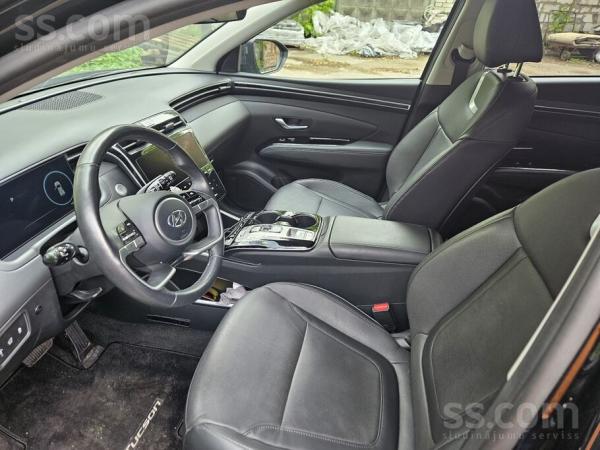 Black Hyundai Tucson 2023 in Riga, with an engine capacity of 2.50 L and mileage of 30 thousand km for 25500 €, photo 7 on AUTOMOTO.COM.LV