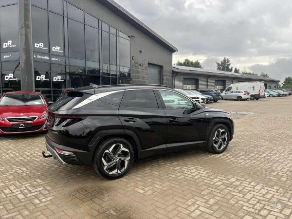 Black Hyundai Tucson 2023 in Taurage, with an engine capacity of 1.60 L and mileage of 114 thousand km for 17900 €, photo 4 on AUTOMOTO.COM.LV