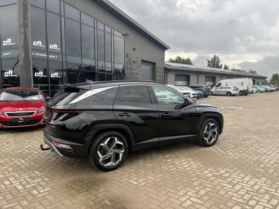Black Hyundai Tucson 2023 in Taurage, with an engine capacity of 1.60 L and mileage of 114 thousand km for 17900 €, photo 5 on AUTOMOTO.COM.LV
