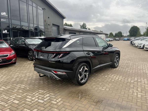 Black Hyundai Tucson 2023 in Taurage, with an engine capacity of 1.60 L and mileage of 114 thousand km for 17900 €, photo 5 on AUTOMOTO.COM.LV