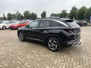 Black Hyundai Tucson 2023 in Taurage, with an engine capacity of 1.60 L and mileage of 114 thousand km for 17900 €, photo 12 on AUTOMOTO.COM.LV