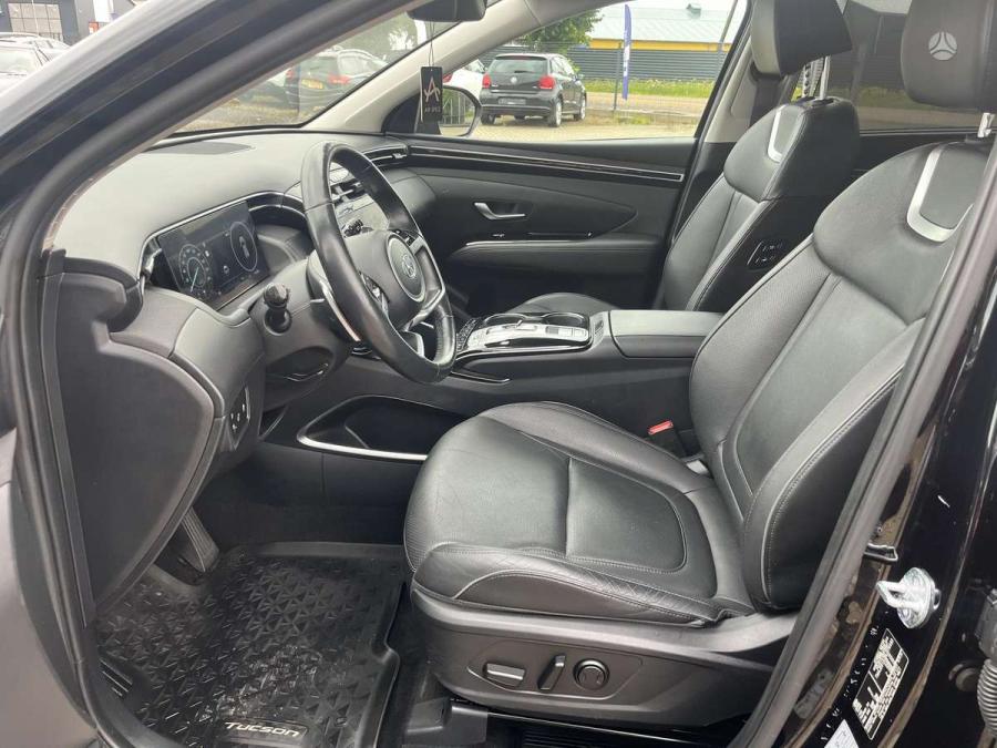 Black Hyundai Tucson 2023 in Taurage, with an engine capacity of 1.60 L and mileage of 114 thousand km for 17900 €, photo 13 on AUTOMOTO.COM.LV