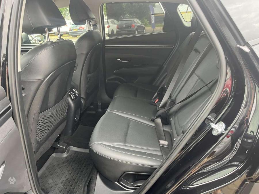 Black Hyundai Tucson 2023 in Taurage, with an engine capacity of 1.60 L and mileage of 114 thousand km for 17900 €, photo 26 on AUTOMOTO.COM.LV