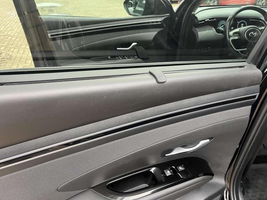 Black Hyundai Tucson 2023 in Taurage, with an engine capacity of 1.60 L and mileage of 114 thousand km for 17900 €, photo 27 on AUTOMOTO.COM.LV