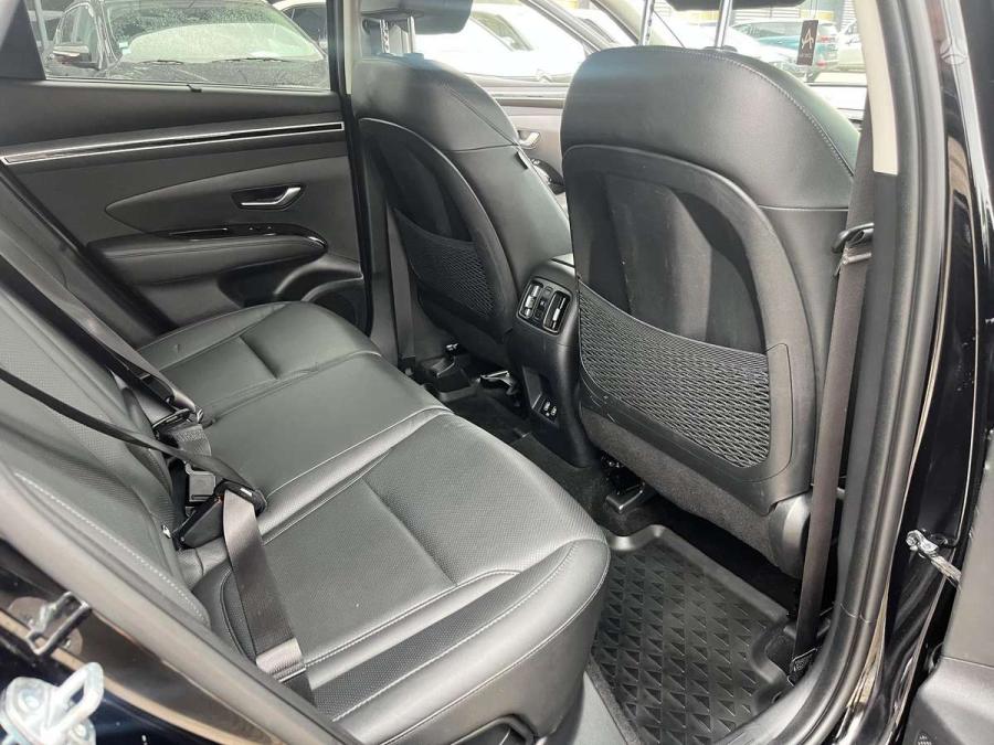 Black Hyundai Tucson 2023 in Taurage, with an engine capacity of 1.60 L and mileage of 114 thousand km for 17900 €, photo 36 on AUTOMOTO.COM.LV