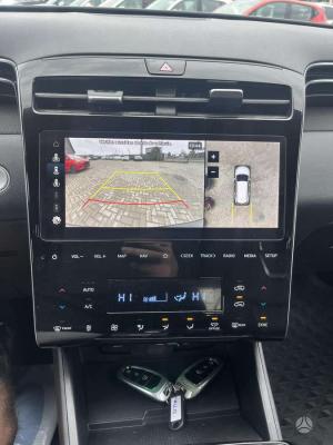 Black Hyundai Tucson 2023 in Taurage, with an engine capacity of 1.60 L and mileage of 114 thousand km for 17900 €, photo 43 on AUTOMOTO.COM.LV