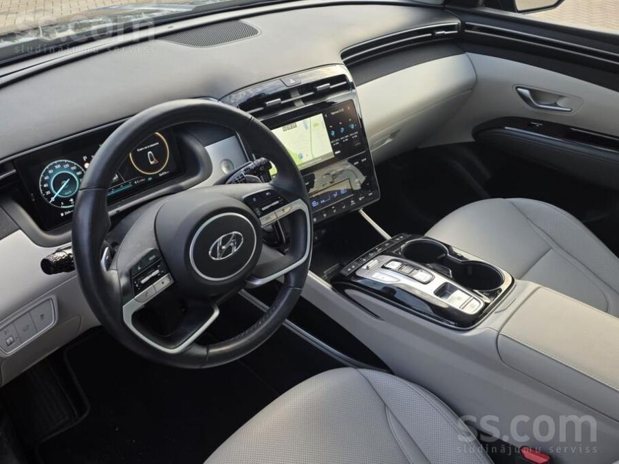 Black Hyundai Tucson 2023 in Riga, with an engine capacity of 1.60 L and mileage of 37 thousand km for 27490 €, photo 4 on AUTOMOTO.COM.LV