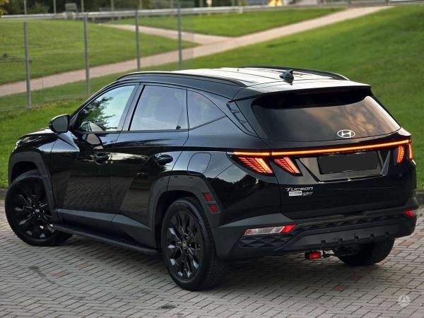 Black Hyundai Tucson 2023 in Radviliskis, with an engine capacity of 2.50 L and mileage of 77 thousand km for 23500 €, photo 6 on AUTOMOTO.COM.LV