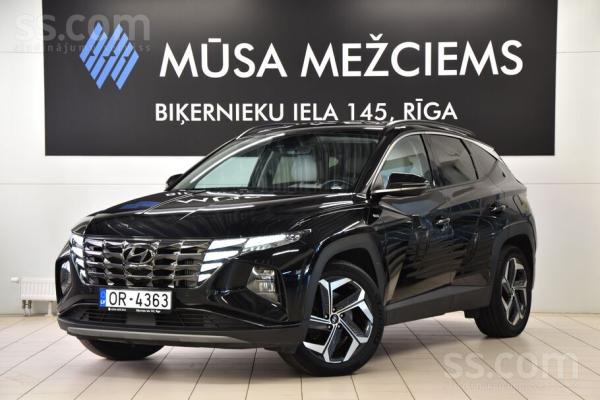 Black Hyundai Tucson 2023 in Riga, with an engine capacity of 1.60 L and mileage of 81 thousand km for 23990 €, photo 1 on AUTOMOTO.COM.LV