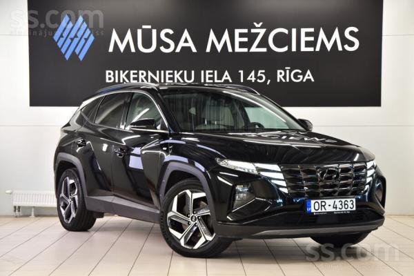 Black Hyundai Tucson 2023 in Riga, with an engine capacity of 1.60 L and mileage of 81 thousand km for 23990 €, photo 4 on AUTOMOTO.COM.LV