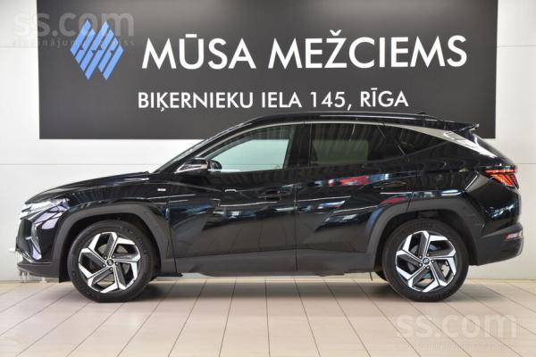 Black Hyundai Tucson 2023 in Riga, with an engine capacity of 1.60 L and mileage of 81 thousand km for 23990 €, photo 6 on AUTOMOTO.COM.LV