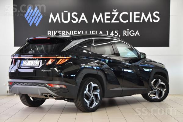 Black Hyundai Tucson 2023 in Riga, with an engine capacity of 1.60 L and mileage of 81 thousand km for 23990 €, photo 7 on AUTOMOTO.COM.LV