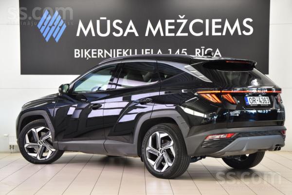 Black Hyundai Tucson 2023 in Riga, with an engine capacity of 1.60 L and mileage of 81 thousand km for 23990 €, photo 9 on AUTOMOTO.COM.LV