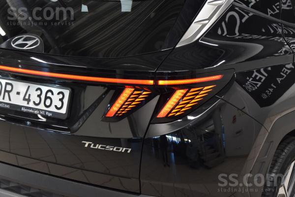 Black Hyundai Tucson 2023 in Riga, with an engine capacity of 1.60 L and mileage of 81 thousand km for 23990 €, photo 10 on AUTOMOTO.COM.LV