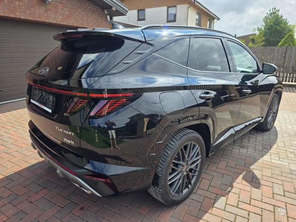 Black Hyundai Tucson 2024 in Siauliai, with an engine capacity of 1.60 L and mileage of 83 thousand km for 25700 €, photo 5 on AUTOMOTO.COM.LV
