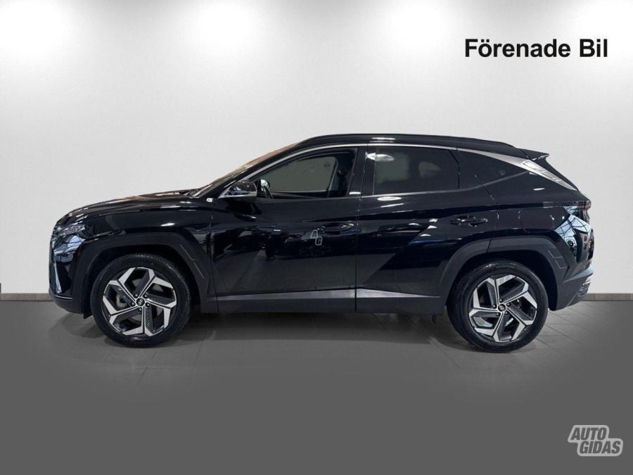 Black Hyundai Tucson 2021 in Kaunas, with an engine capacity of 0.00 L and mileage of 70 thousand km for 29453 €, photo 3 on AUTOMOTO.COM.LV