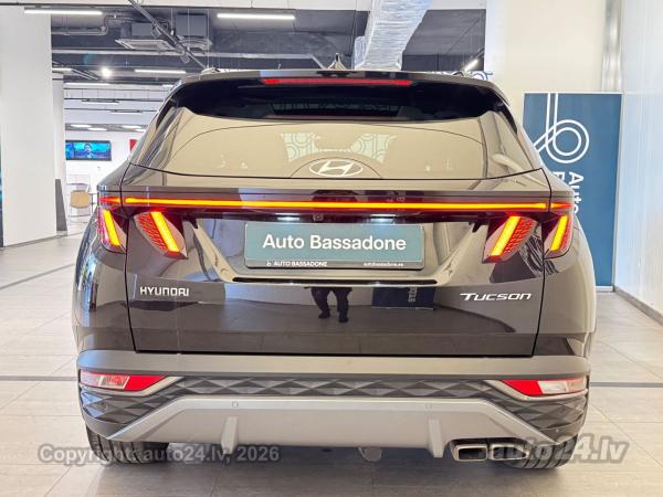 Black Hyundai Tucson 2022 in Tallinn, with an engine capacity of 1.60 L and mileage of 67 thousand km for 23900 €, photo 4 on AUTOMOTO.COM.LV