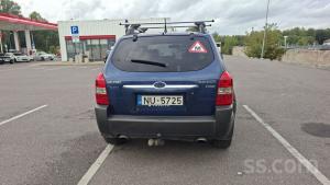 Zils Hyundai Tucson 2005 Rīga, ar dzinēja tilpumu 2.00 L un nobraukumu 253 tūkst. km par 2099 €, foto 7 vietnē AUTOMOTO.COM.LV