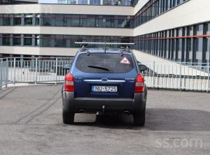Zils Hyundai Tucson 2005 Rīga, ar dzinēja tilpumu 2.00 L un nobraukumu 254 tūkst. km par 2580 €, foto 6 vietnē AUTOMOTO.COM.LV