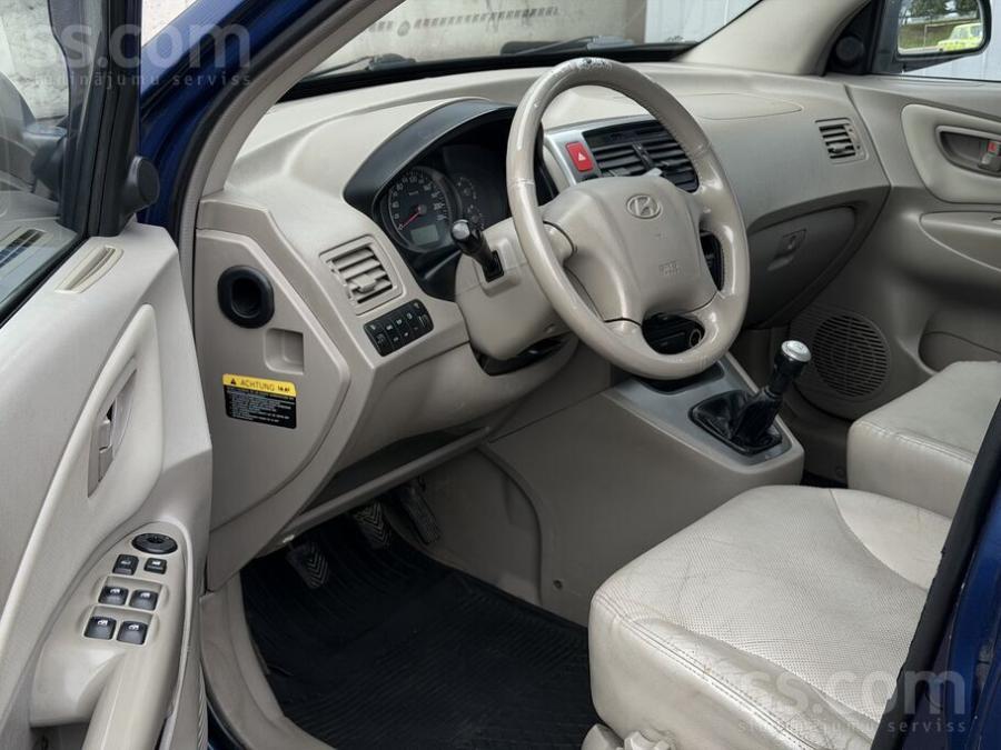 Zils Hyundai Tucson 2005 Rīga, ar dzinēja tilpumu 2.00 L un nobraukumu 254 tūkst. km par 2580 €, foto 8 vietnē AUTOMOTO.COM.LV