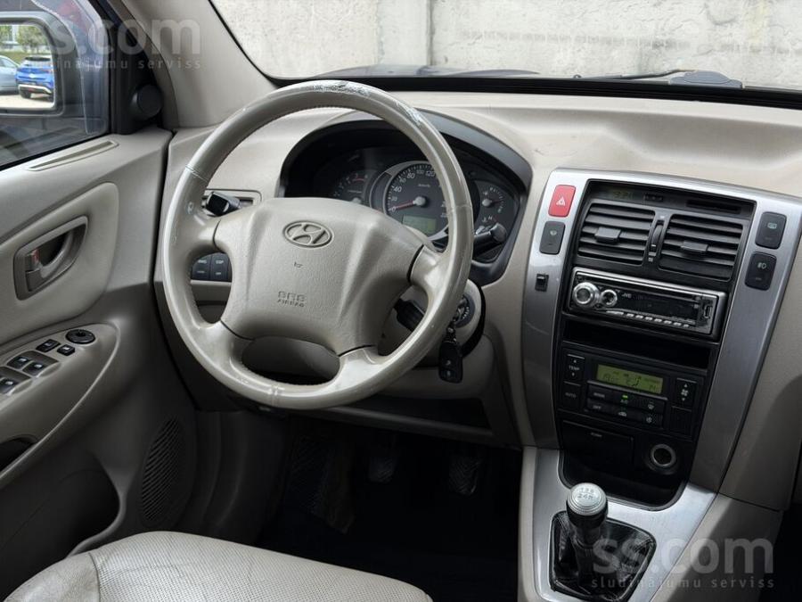Zils Hyundai Tucson 2005 Rīga, ar dzinēja tilpumu 2.00 L un nobraukumu 254 tūkst. km par 2580 €, foto 12 vietnē AUTOMOTO.COM.LV
