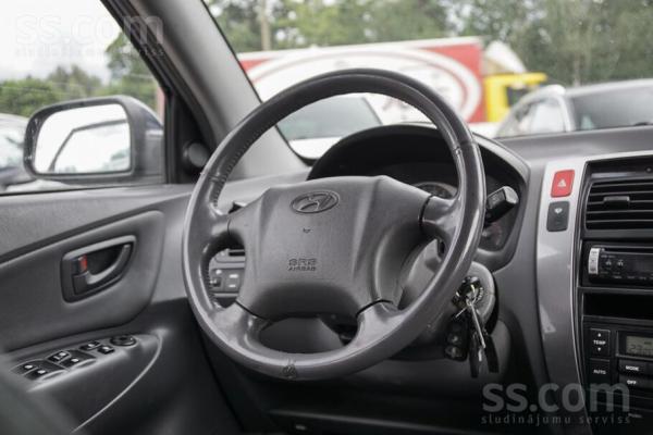 Zils Hyundai Tucson 2006 Rīga, ar dzinēja tilpumu 2.00 L un nobraukumu 176 tūkst. km par 2990 €, foto 10 vietnē AUTOMOTO.COM.LV