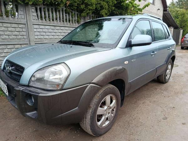 Blue Hyundai Tucson 2006 in Marijampole, with an engine capacity of 2.66 L and mileage of 280 thousand km for 2500 €, photo 1 on AUTOMOTO.COM.LV