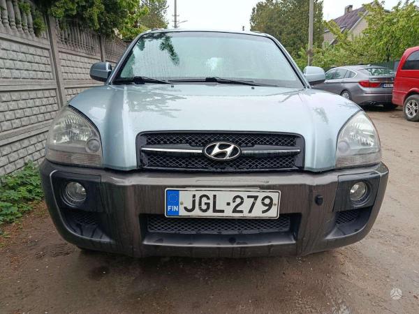 Blue Hyundai Tucson 2006 in Marijampole, with an engine capacity of 2.66 L and mileage of 280 thousand km for 2500 €, photo 2 on AUTOMOTO.COM.LV