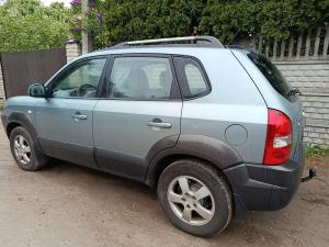 Blue Hyundai Tucson 2006 in Marijampole, with an engine capacity of 2.66 L and mileage of 280 thousand km for 2500 €, photo 7 on AUTOMOTO.COM.LV