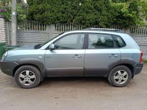 Blue Hyundai Tucson 2006 in Marijampole, with an engine capacity of 2.66 L and mileage of 280 thousand km for 2500 €, photo 8 on AUTOMOTO.COM.LV
