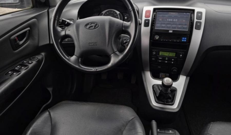 Zils Hyundai Tucson 2007 Rīga, ar dzinēja tilpumu 2.00 L un nobraukumu 246 tūkst. km par 3200 €, foto 16 vietnē AUTOMOTO.COM.LV
