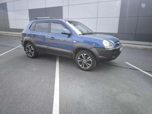 Blue Hyundai Tucson 2008 in Vilnius, with an engine capacity of 1.98 L and mileage of 199 thousand km for 2650 €, photo 5 on AUTOMOTO.COM.LV