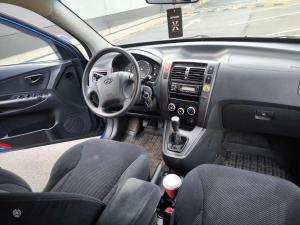 Blue Hyundai Tucson 2008 in Vilnius, with an engine capacity of 1.98 L and mileage of 199 thousand km for 2650 €, photo 16 on AUTOMOTO.COM.LV