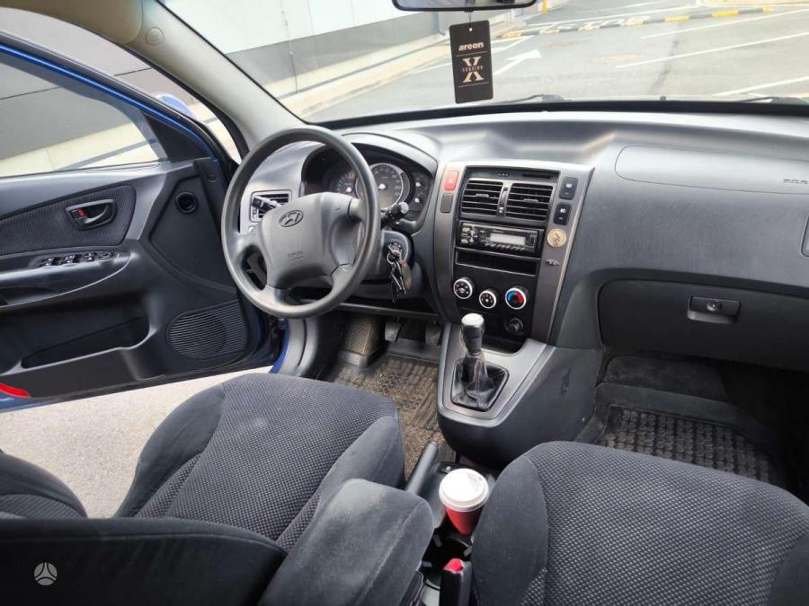 Blue Hyundai Tucson 2008 in Vilnius, with an engine capacity of 1.98 L and mileage of 199 thousand km for 2650 €, photo 16 on AUTOMOTO.COM.LV