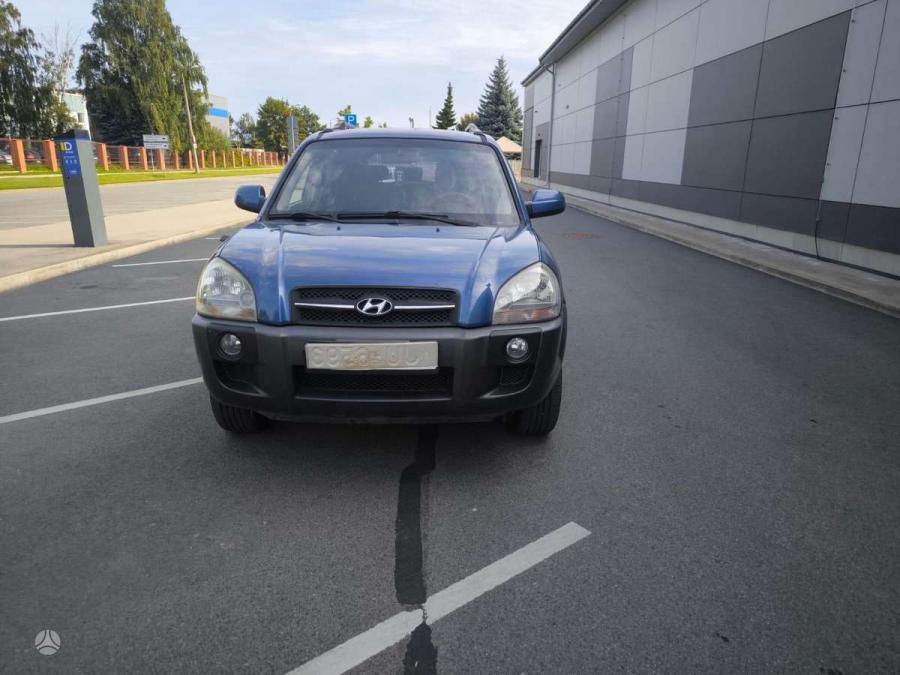 Zils Hyundai Tucson 2008 Viļņa, ar dzinēja tilpumu 1.98 L un nobraukumu 199 tūkst. km par 2600 €, foto 1 vietnē AUTOMOTO.COM.LV