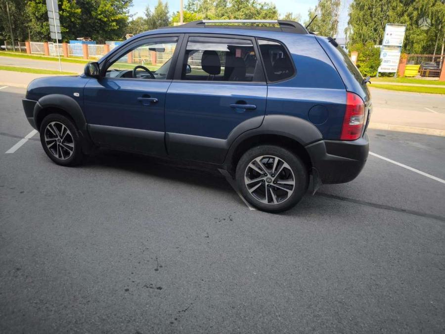 Zils Hyundai Tucson 2008 Viļņa, ar dzinēja tilpumu 1.98 L un nobraukumu 199 tūkst. km par 2600 €, foto 10 vietnē AUTOMOTO.COM.LV