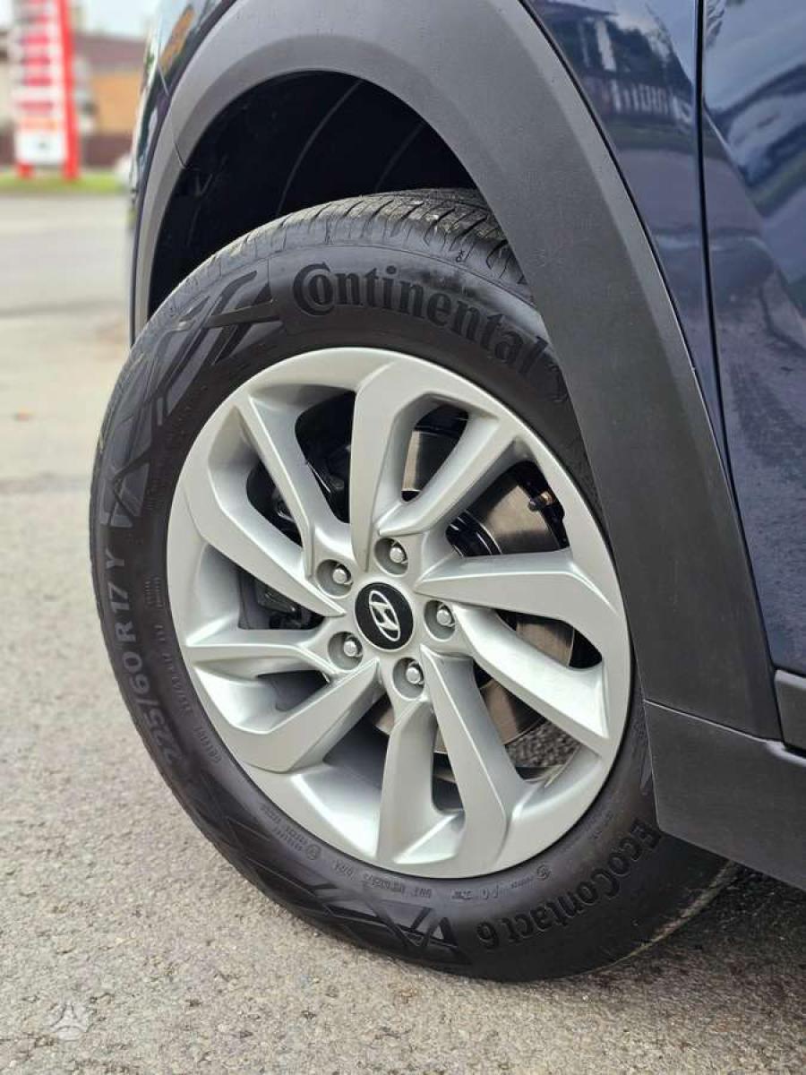 Blue Hyundai Tucson 2018 in Siauliai, with an engine capacity of 1.60 L and mileage of 206 thousand km for 11950 €, photo 15 on AUTOMOTO.COM.LV