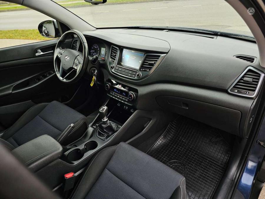 Blue Hyundai Tucson 2018 in Siauliai, with an engine capacity of 1.60 L and mileage of 206 thousand km for 11950 €, photo 18 on AUTOMOTO.COM.LV
