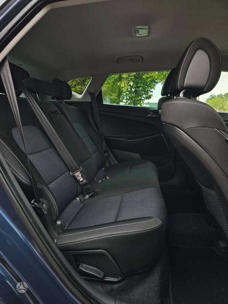 Blue Hyundai Tucson 2018 in Siauliai, with an engine capacity of 1.60 L and mileage of 206 thousand km for 11950 €, photo 21 on AUTOMOTO.COM.LV