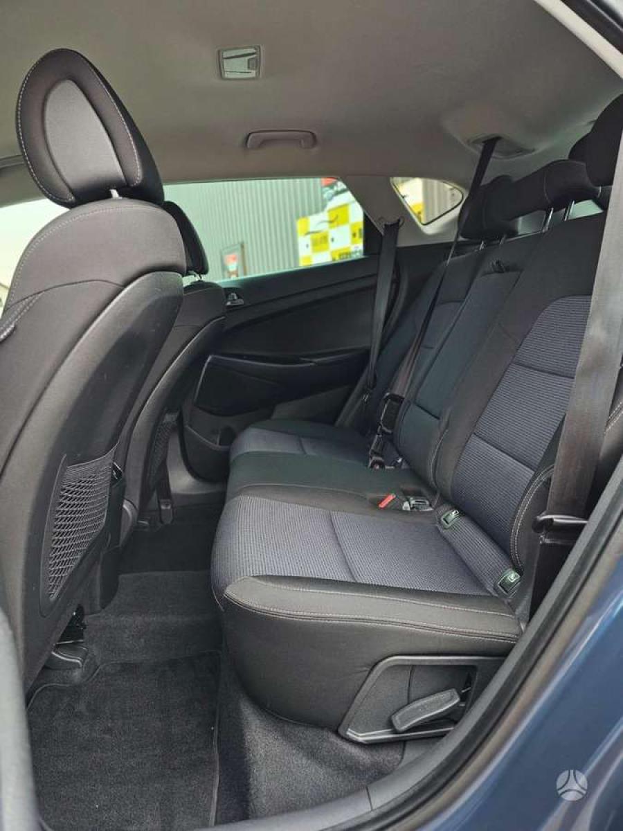 Blue Hyundai Tucson 2018 in Siauliai, with an engine capacity of 1.60 L and mileage of 206 thousand km for 11950 €, photo 23 on AUTOMOTO.COM.LV