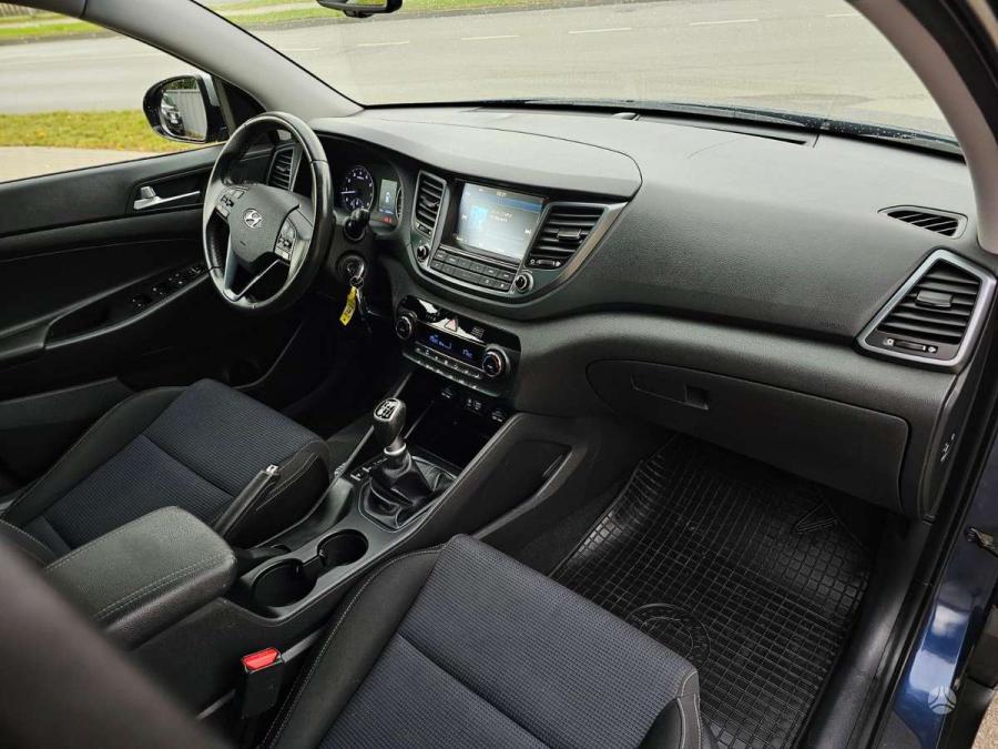 Blue Hyundai Tucson 2018 in Siauliai, with an engine capacity of 1.60 L and mileage of 206 thousand km for 11950 €, photo 18 on AUTOMOTO.COM.LV
