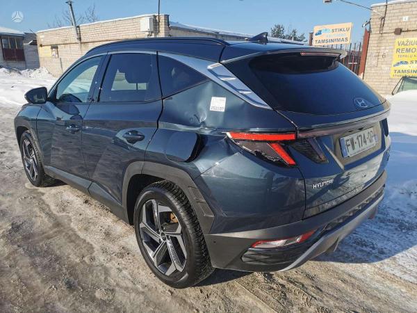 Blue Hyundai Tucson 2021 in Kaunas, with an engine capacity of 1.60 L and mileage of 81 thousand km for 14300 €, photo 2 on AUTOMOTO.COM.LV