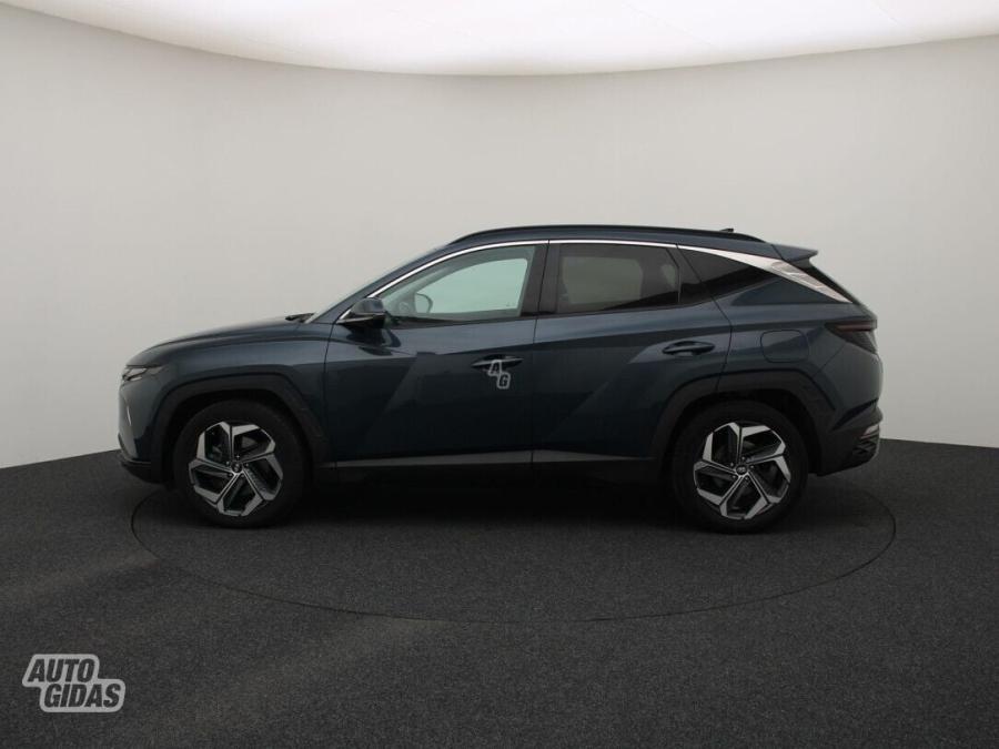 Blue Hyundai Tucson 2021 in Vilnius, with an engine capacity of 1.60 L and mileage of 90 thousand km for 24999 €, photo 6 on AUTOMOTO.COM.LV