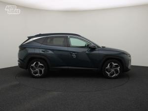 Blue Hyundai Tucson 2021 in Vilnius, with an engine capacity of 1.60 L and mileage of 90 thousand km for 24999 €, photo 9 on AUTOMOTO.COM.LV