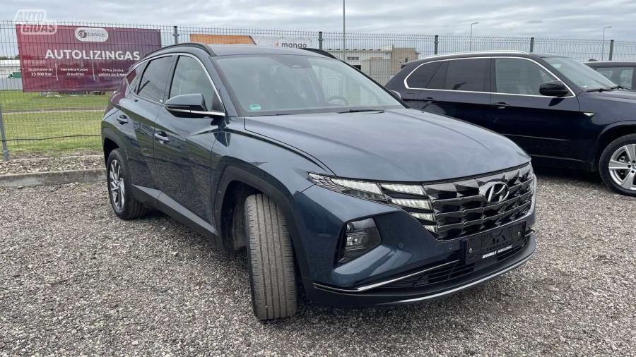 Blue Hyundai Tucson 2021 in Marijampole, with an engine capacity of 1.60 L and mileage of 71 thousand km for 22650 €, photo 4 on AUTOMOTO.COM.LV