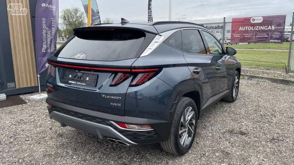 Zils Hyundai Tucson 2021 Marijampole, ar dzinēja tilpumu 1.60 L un nobraukumu 71 tūkst. km par 22650 €, foto 9 vietnē AUTOMOTO.COM.LV