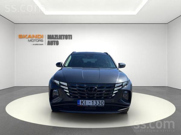 Blue Hyundai Tucson 2021 in Riga, with an engine capacity of 1.60 L and mileage of 69 thousand km for 21490 €, photo 2 on AUTOMOTO.COM.LV