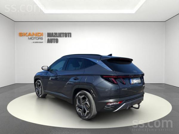 Blue Hyundai Tucson 2021 in Riga, with an engine capacity of 1.60 L and mileage of 69 thousand km for 21490 €, photo 4 on AUTOMOTO.COM.LV