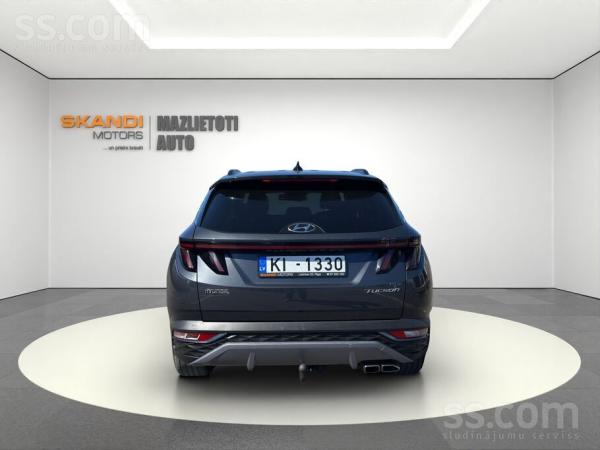 Blue Hyundai Tucson 2021 in Riga, with an engine capacity of 1.60 L and mileage of 69 thousand km for 21490 €, photo 5 on AUTOMOTO.COM.LV