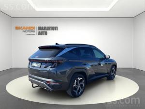 Blue Hyundai Tucson 2021 in Riga, with an engine capacity of 1.60 L and mileage of 69 thousand km for 21490 €, photo 7 on AUTOMOTO.COM.LV